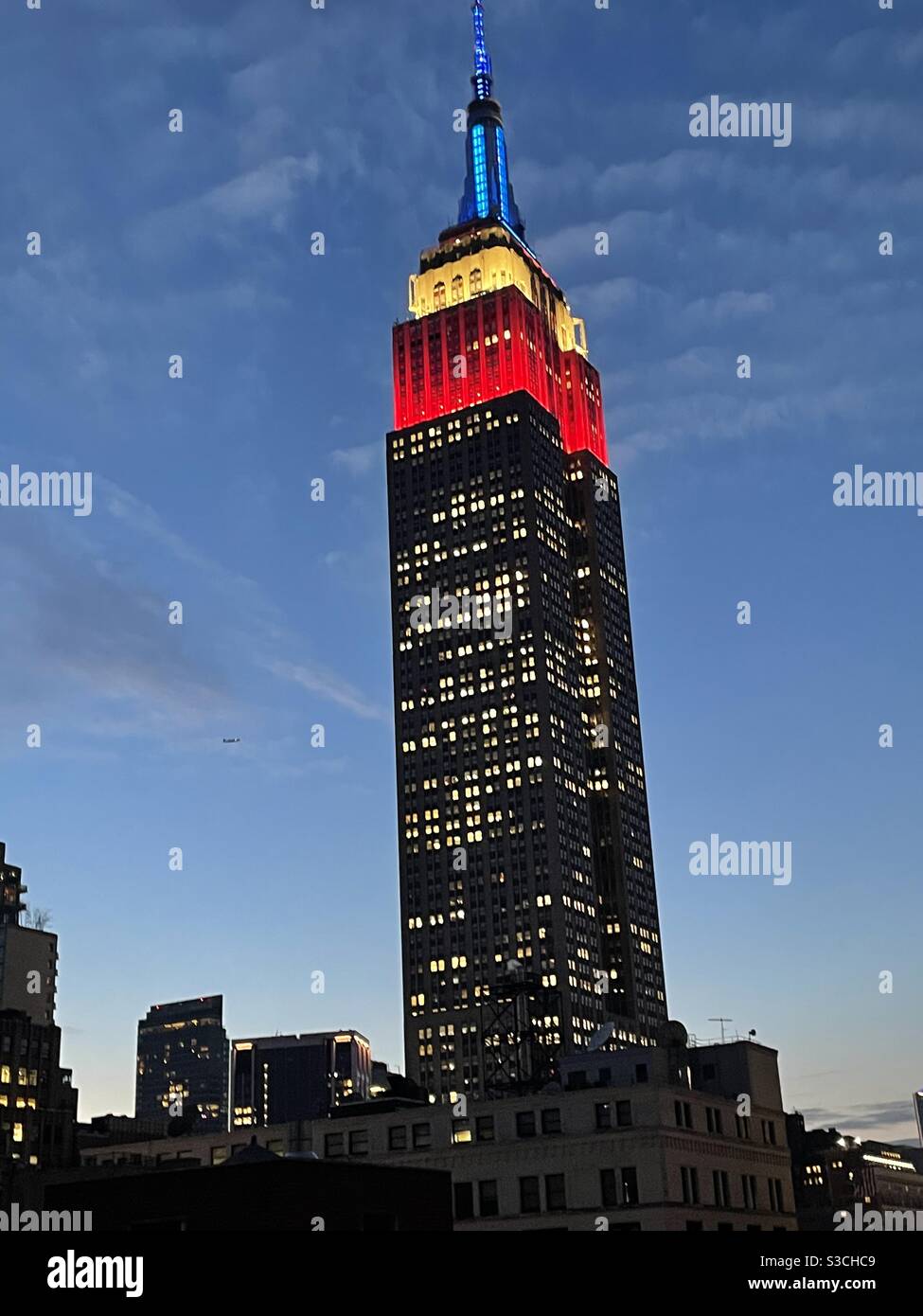 The Empire State building is lit up in patriotic red white and blue ...