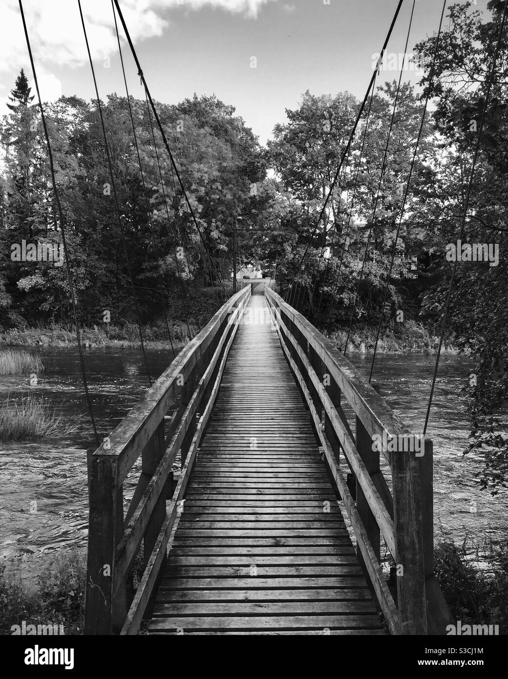 Wooden river bridge Black and White Stock Photos & Images - Alamy