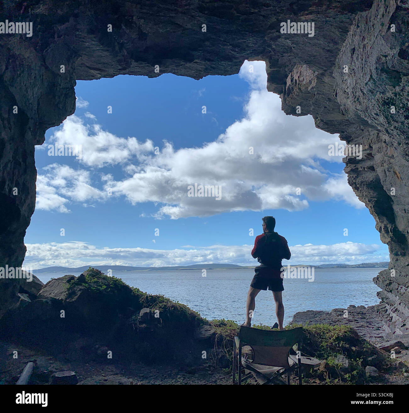 Person in a cave hi-res stock photography and images - Alamy