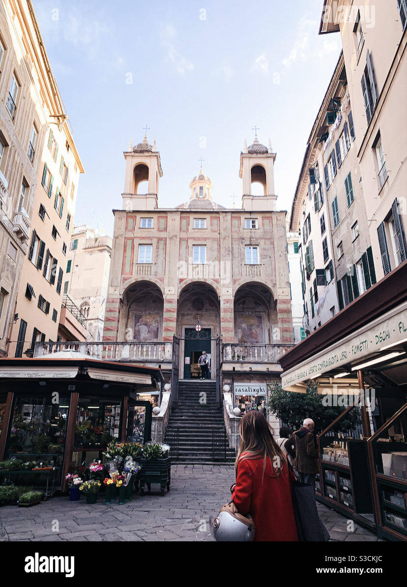 The church between the buildings Stock Photo - Alamy