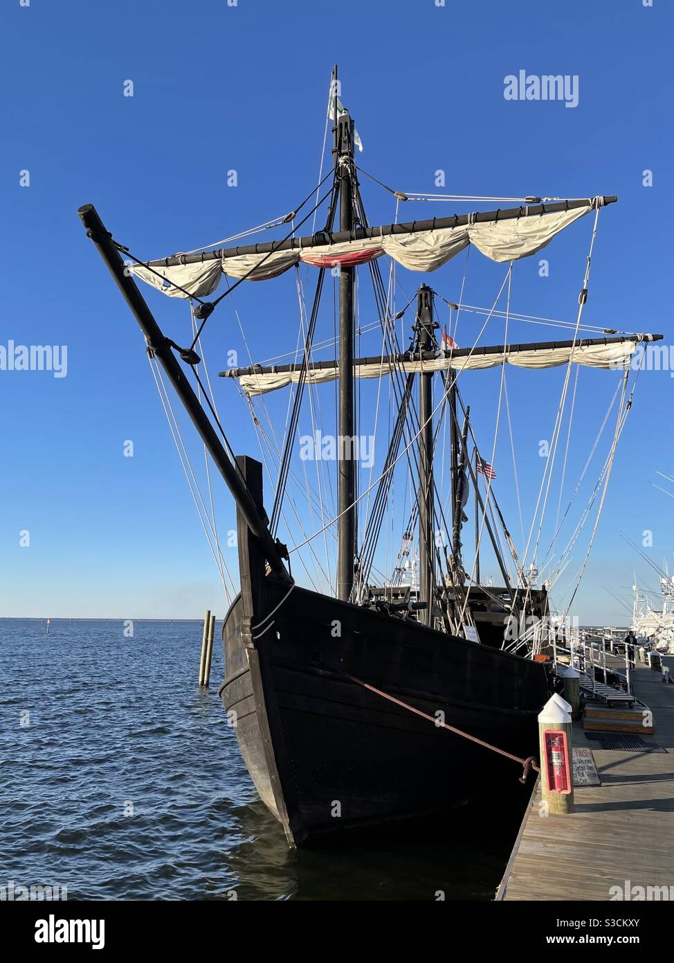 Replica boat of the Nina Pinta docked at a marina Stock Photo - Alamy