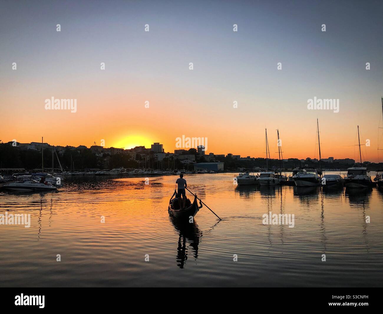 Silhouette boat sailing sea clear sky boat hi-res stock photography and ...