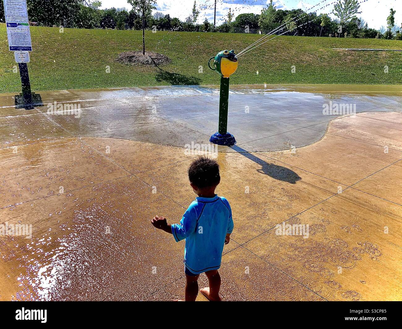 Child splashpad hi-res stock photography and images - Alamy