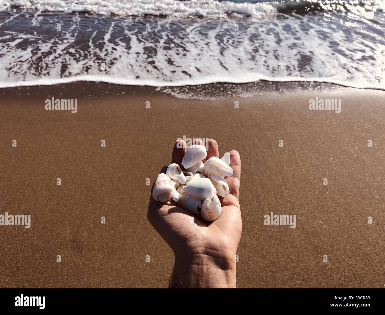 Hand full of sand hi-res stock photography and images - Alamy