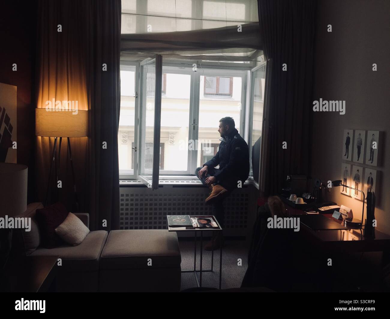 Staring through window hi-res stock photography and images - Alamy