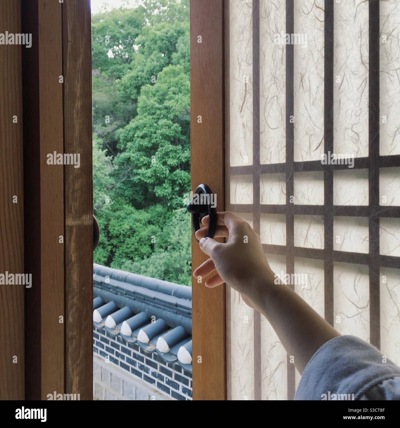 Opening the window in a beautiful Hanok (Korean traditional house Stock ...