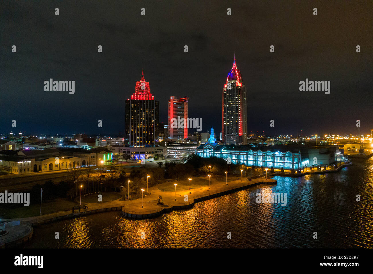 The downtown Mobile, Alabama waterfront skyline at night Stock Photo ...