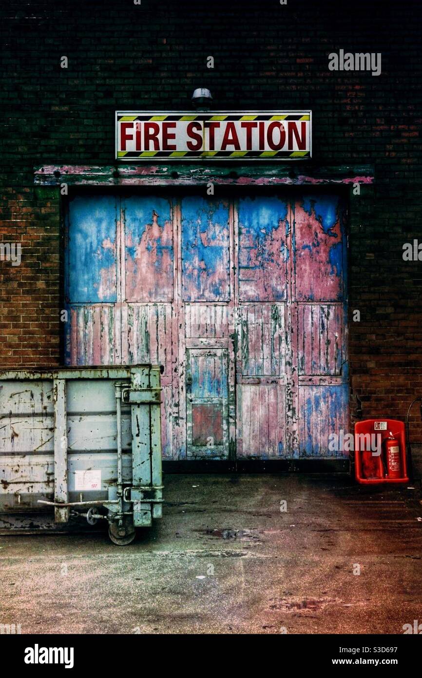 The doorway and sign to a very old deserted and disused fire station ...