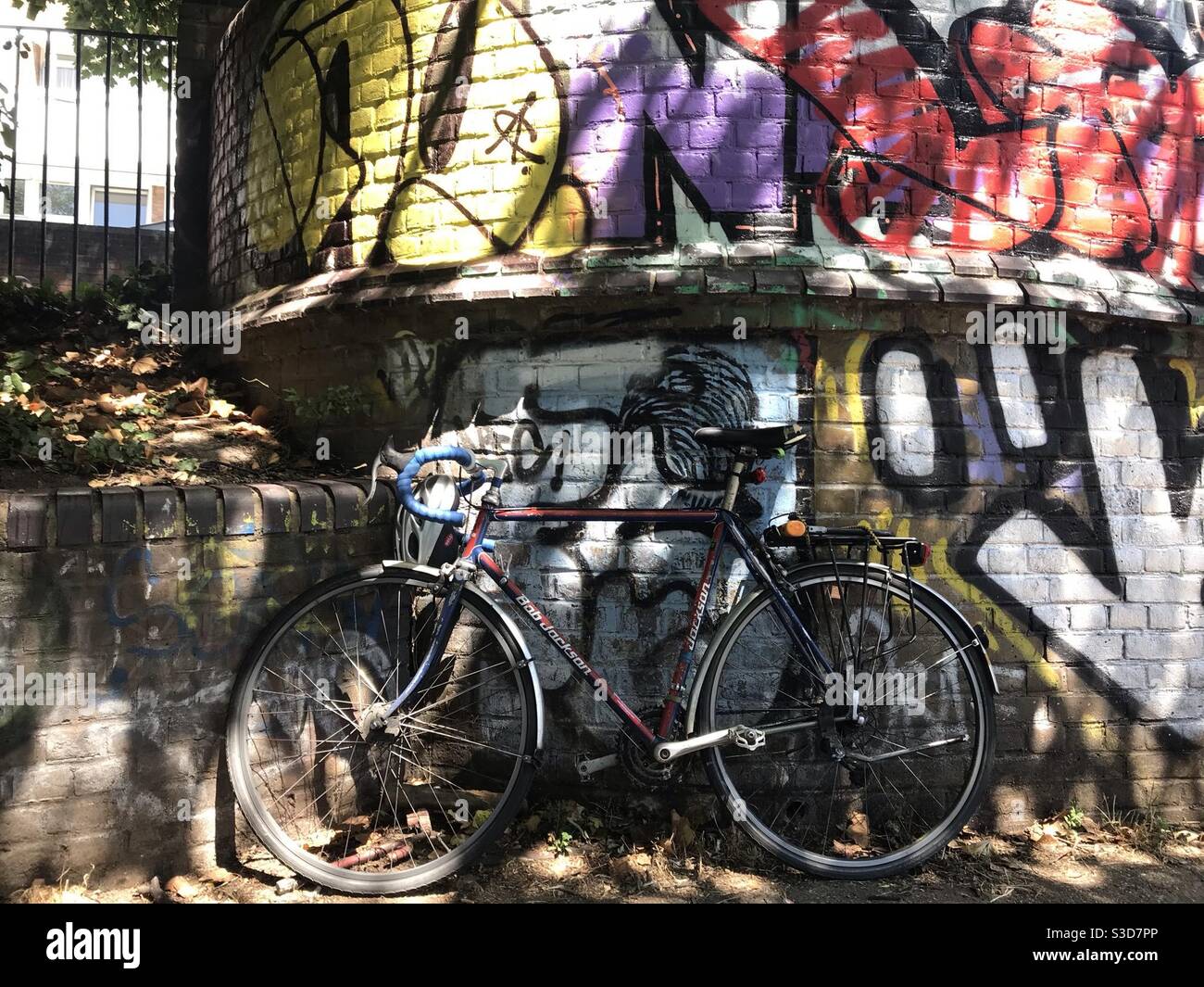 Bike by graffiti Stock Photo - Alamy