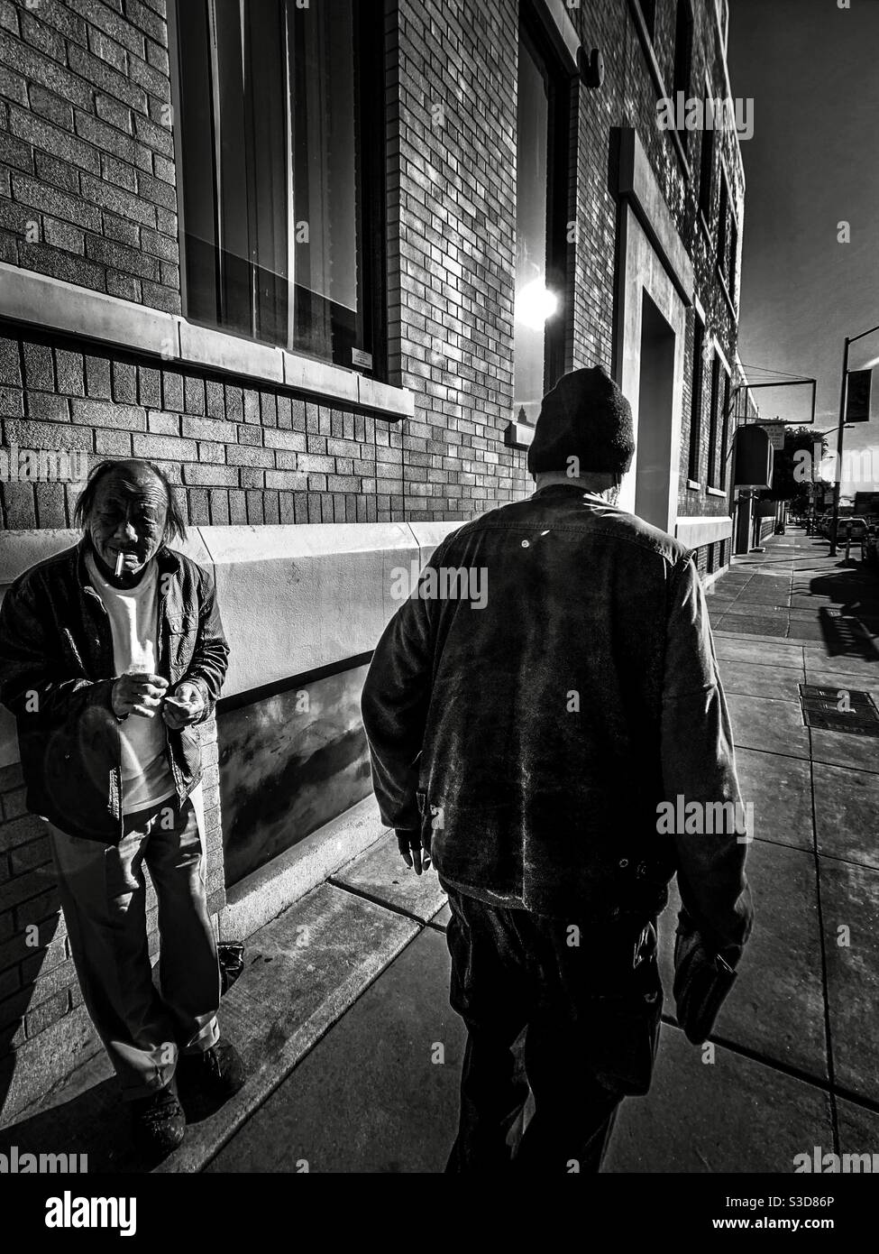 Homeless black man cigarette hi-res stock photography and images - Alamy