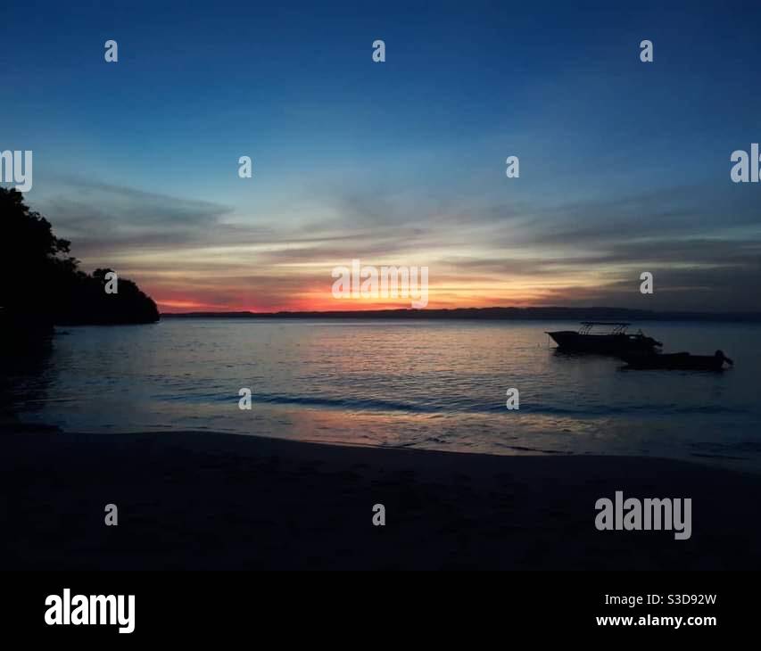 The sunset of a beach in Haiti in the Caraïbe Stock Photo - Alamy