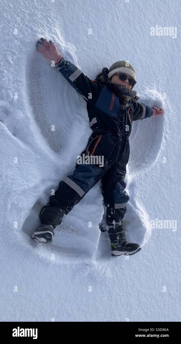 Fun in snow angel hi-res stock photography and images - Alamy