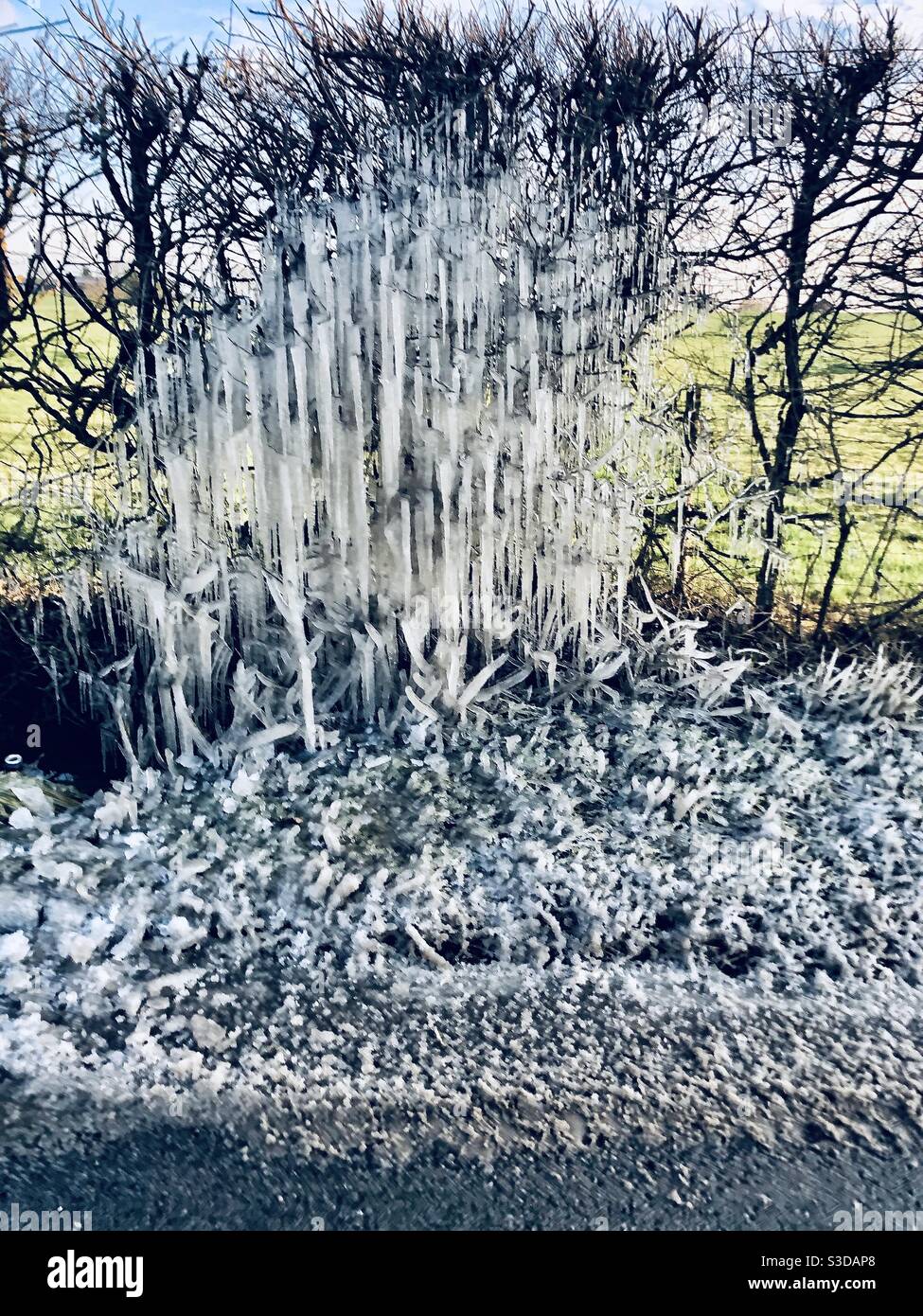 Frozen splash from passing cars Stock Photo - Alamy