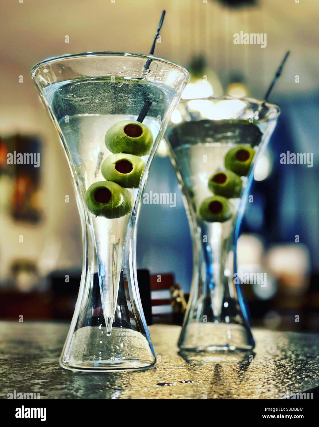 Home Happy hour martinis for two Stock Photo - Alamy