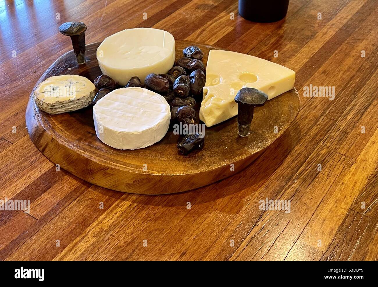 Four cheeses on a cheeseboard Stock Photo - Alamy