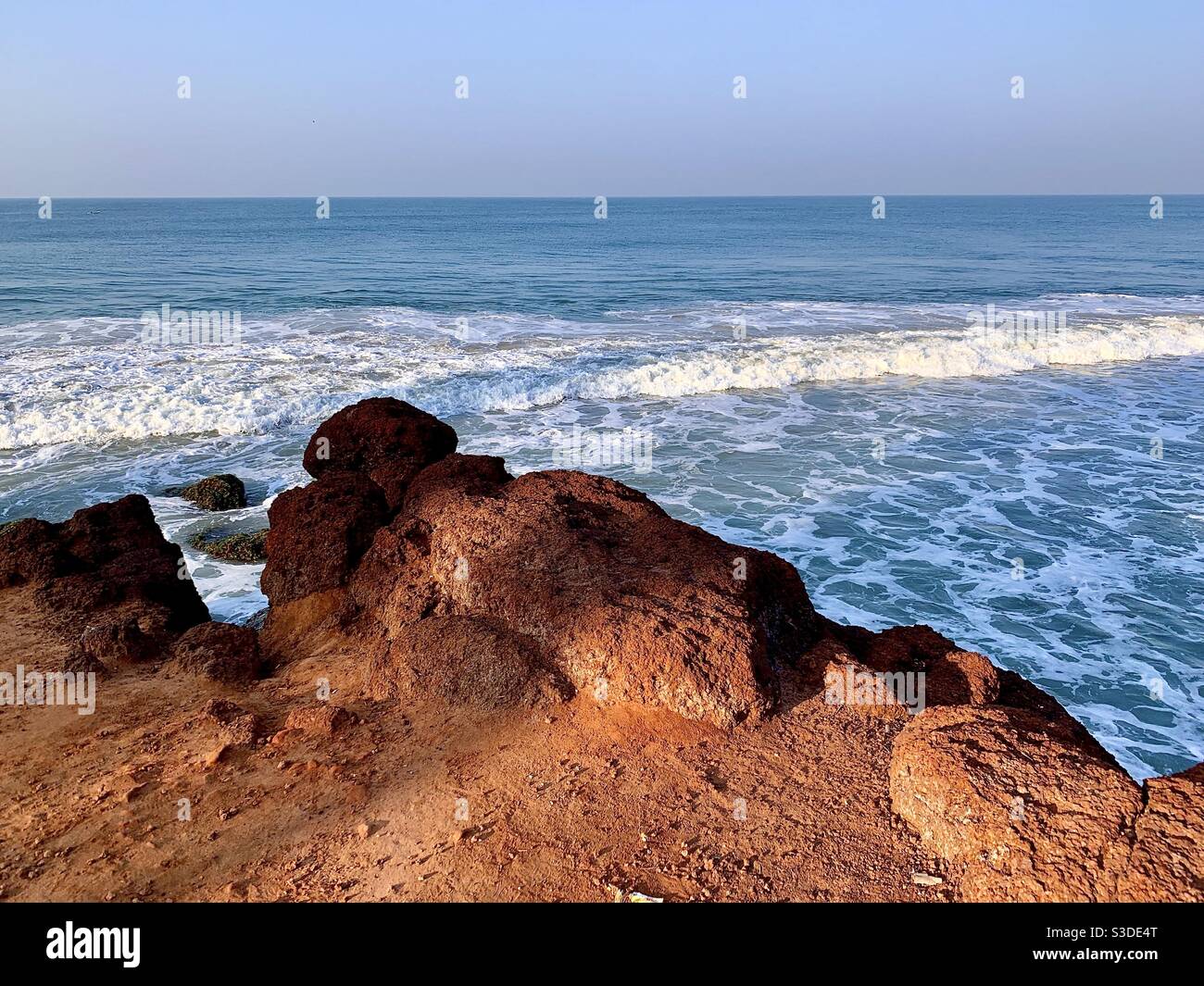Rocks waves kerala hi-res stock photography and images - Alamy