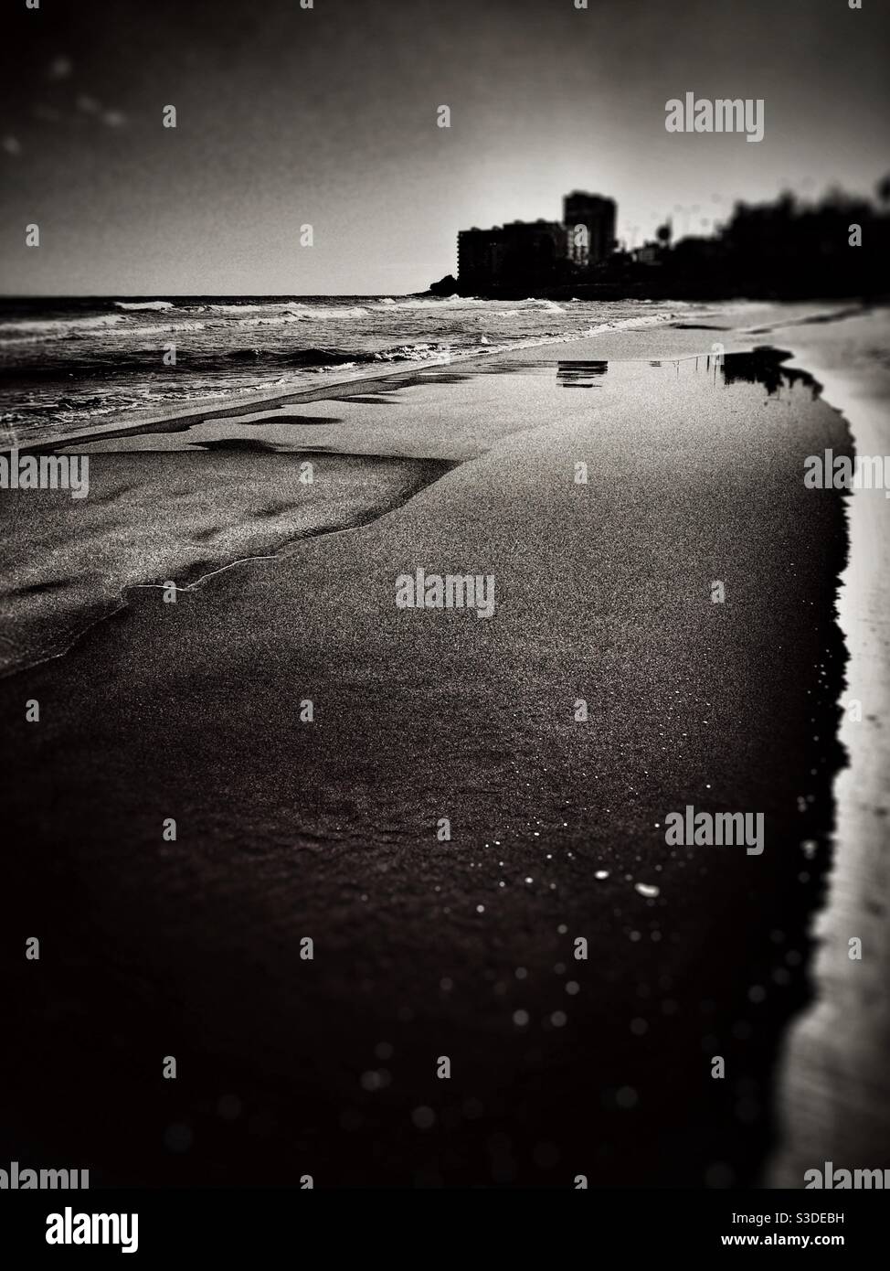 Dramatic beach scene in sepia colours Stock Photo - Alamy