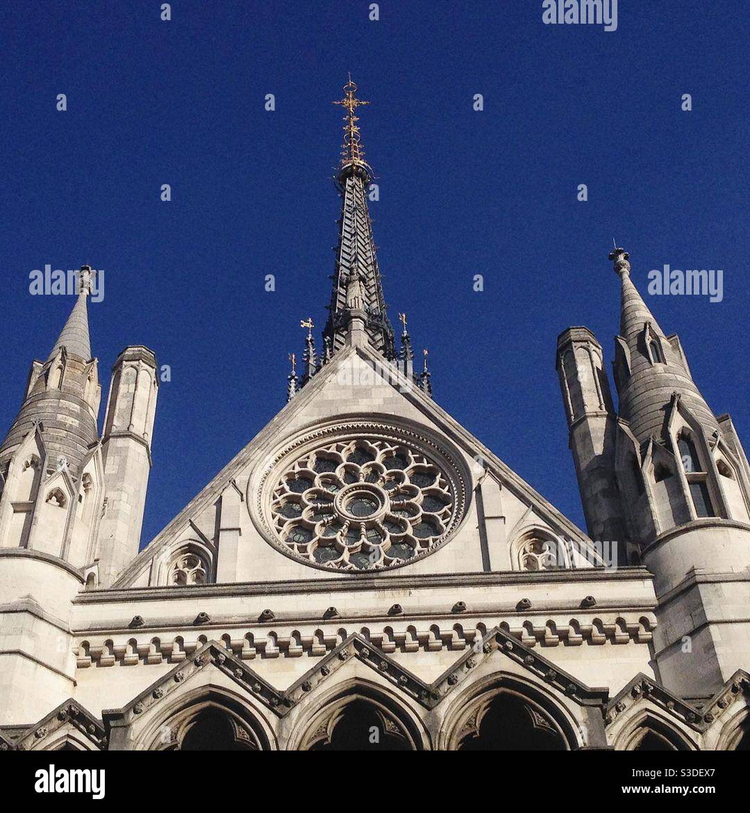 Detail of the sunlit Victorian Gothic Revival architecture of the Royal ...