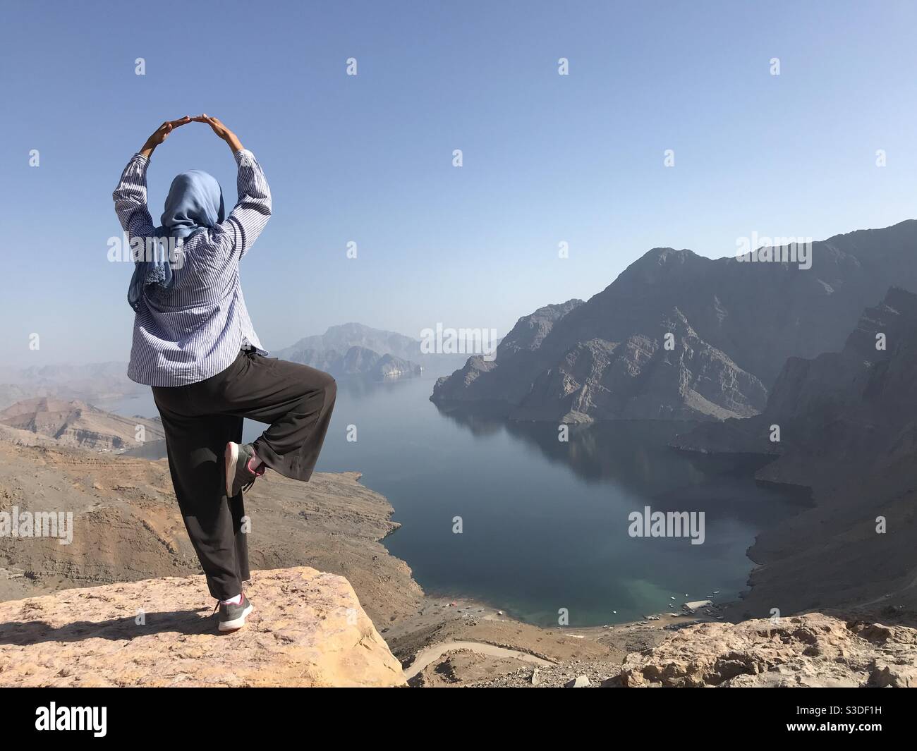Balancing act at panoramic view, al Najd Creek, Khoor Najd Stock Photo ...