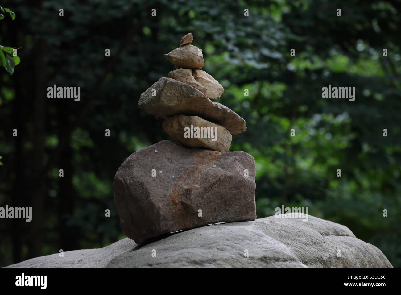 mini figure tower made of stones Stock Photo - Alamy