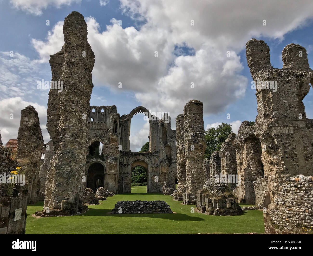 The old ruins of Castle Acre Priory on a beautiful summer day. Near ...