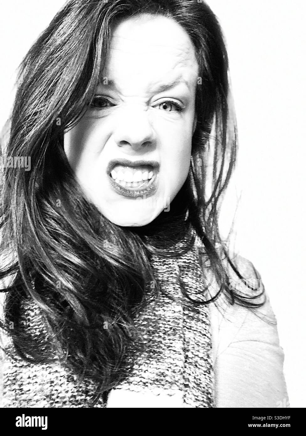 Baring teeth woman hi-res stock photography and images - Alamy