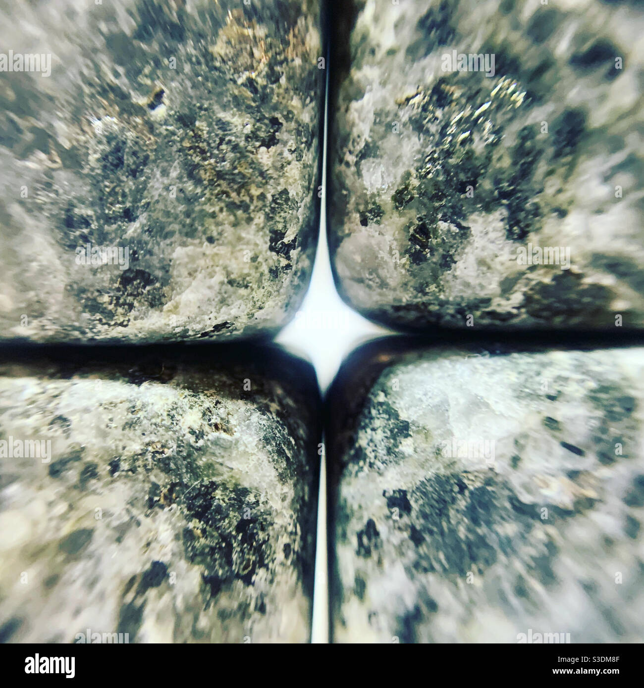 Gap between granite rocks Stock Photo - Alamy