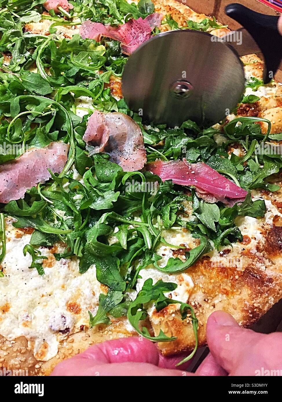 Pizza wheel hi-res stock photography and images - Alamy