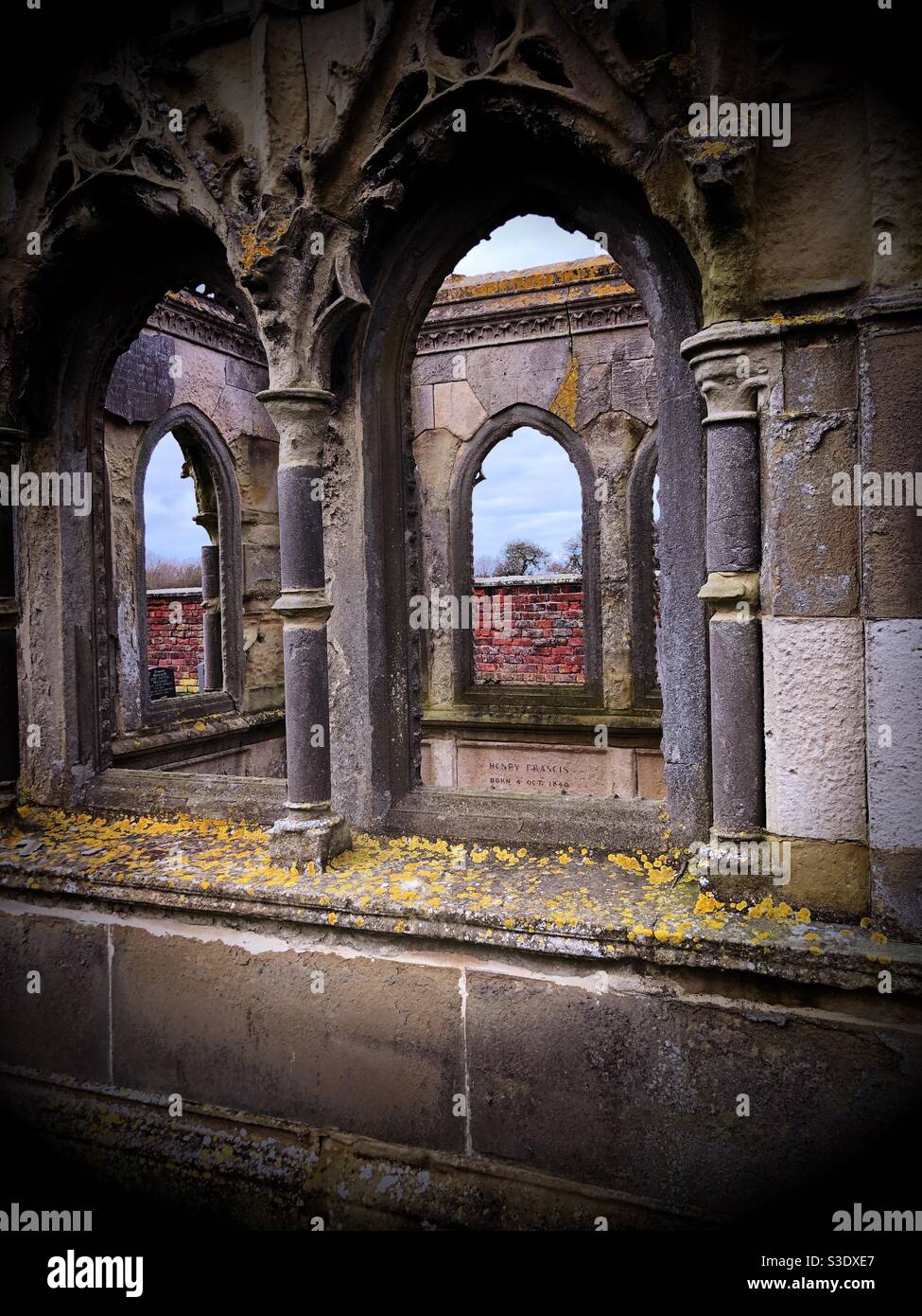 Window arches around an old grave Stock Photo - Alamy