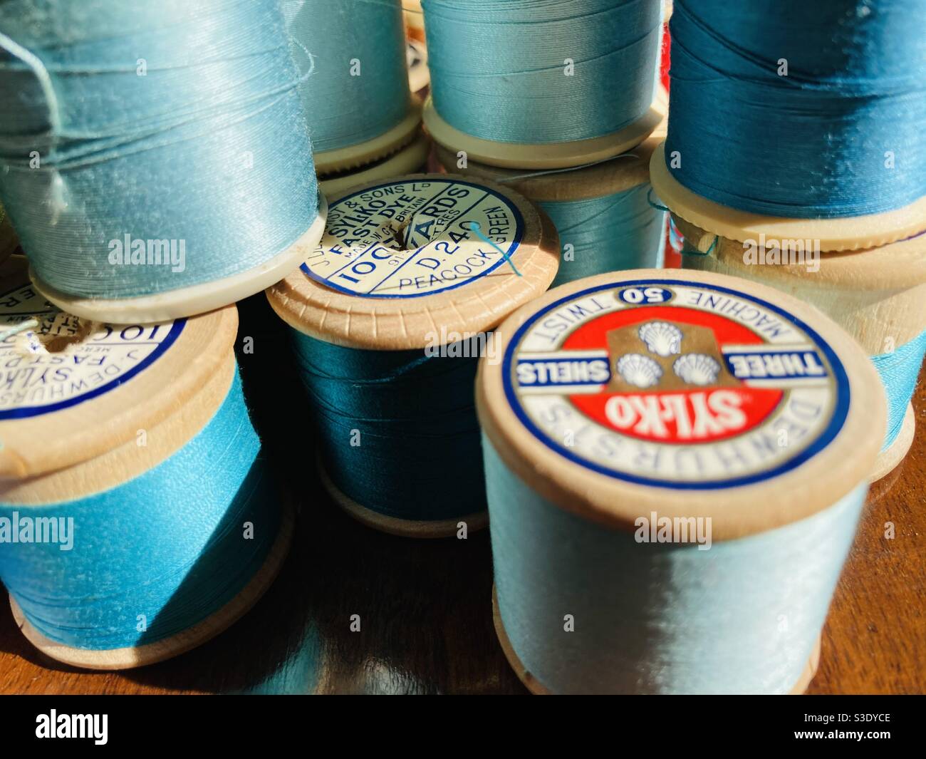 Light blue thread hi-res stock photography and images - Alamy