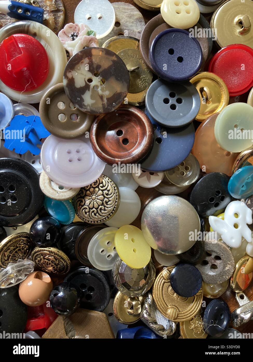 Clothes buttons hi-res stock photography and images - Alamy