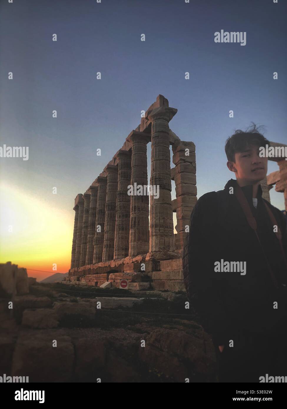 Visiting the Temple of Poseidon during sunset Stock Photo - Alamy