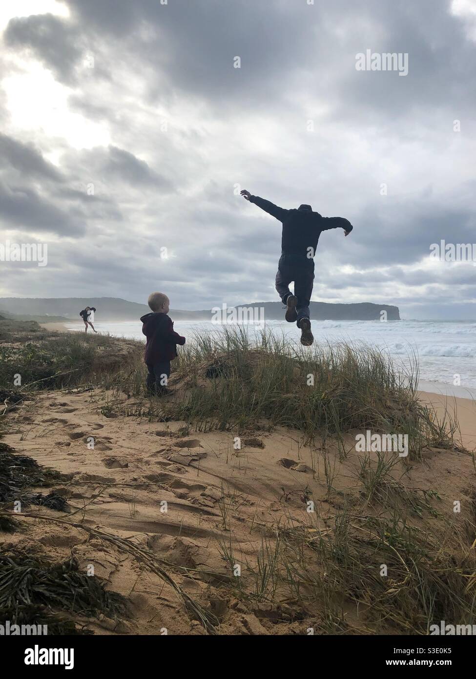 Child jump sand hi-res stock photography and images - Alamy