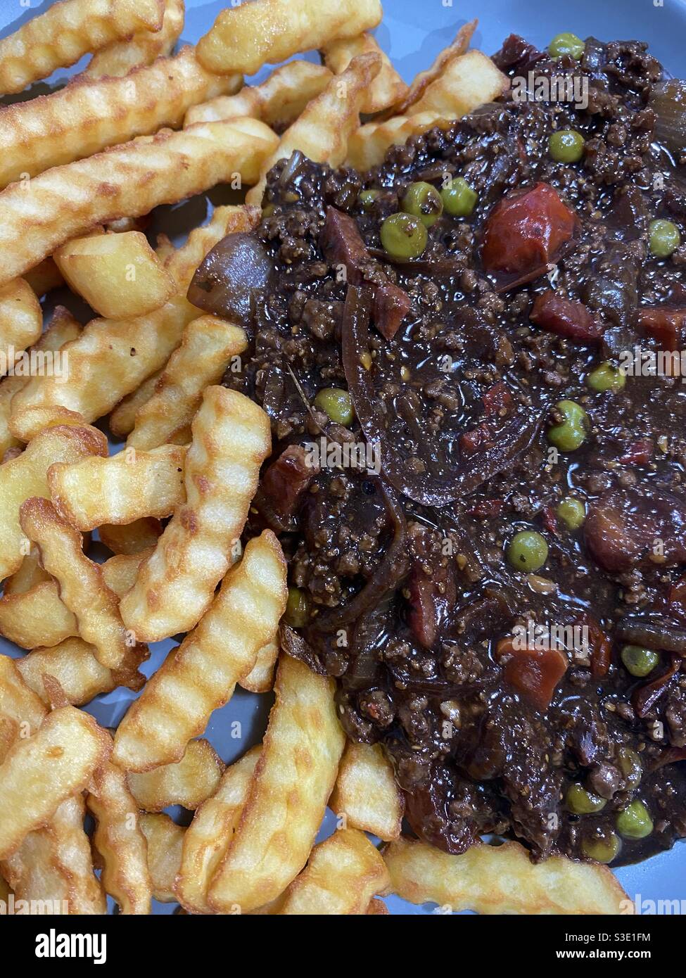 British Take on a Sloppy Joe, cottage pie mix and crinkle cut Chips ...