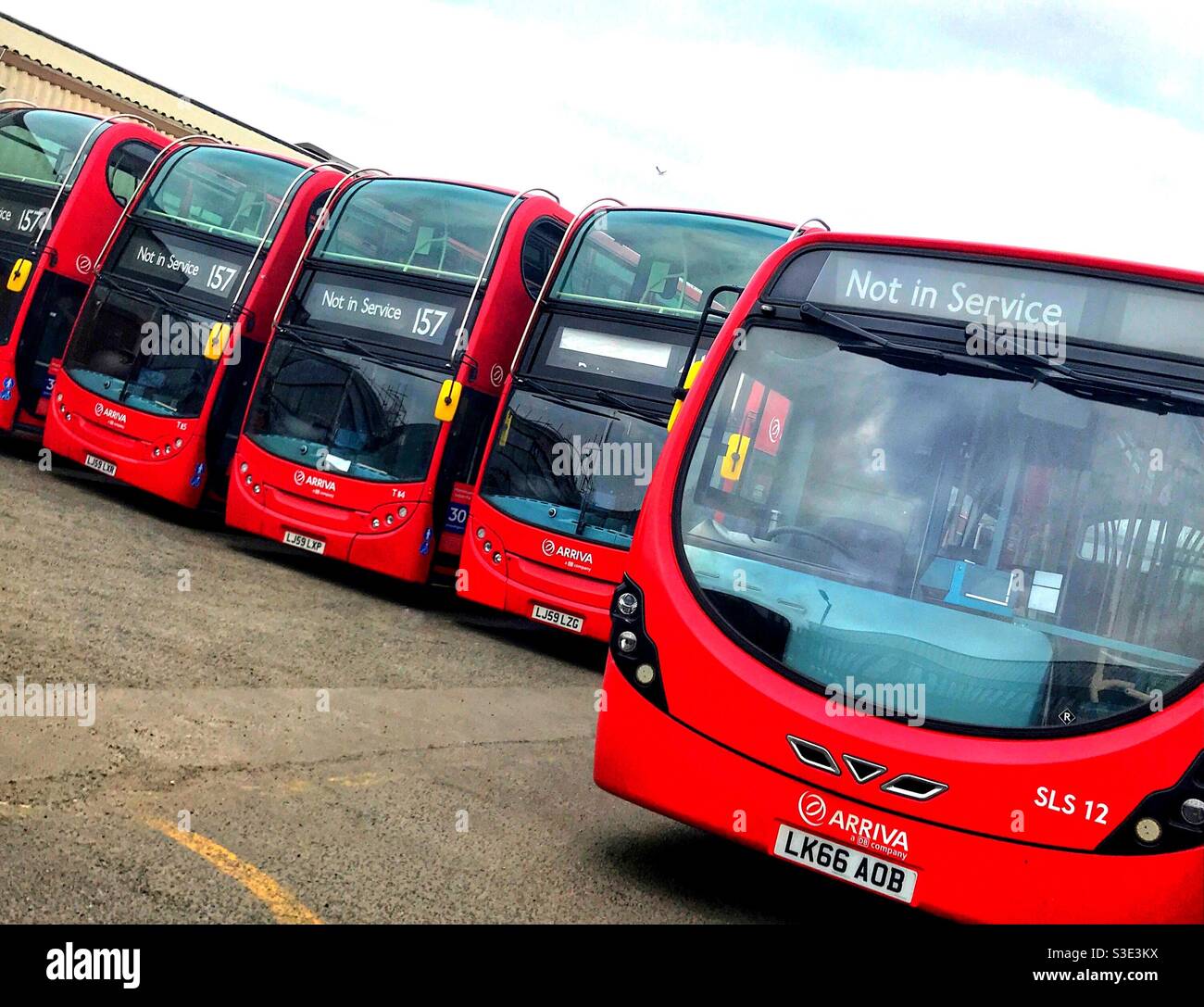 Row of london buses hi-res stock photography and images - Alamy