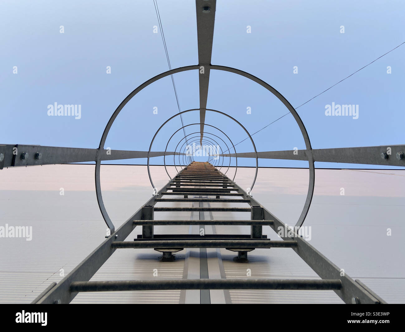 Low angle view of metal ladder Stock Photo - Alamy