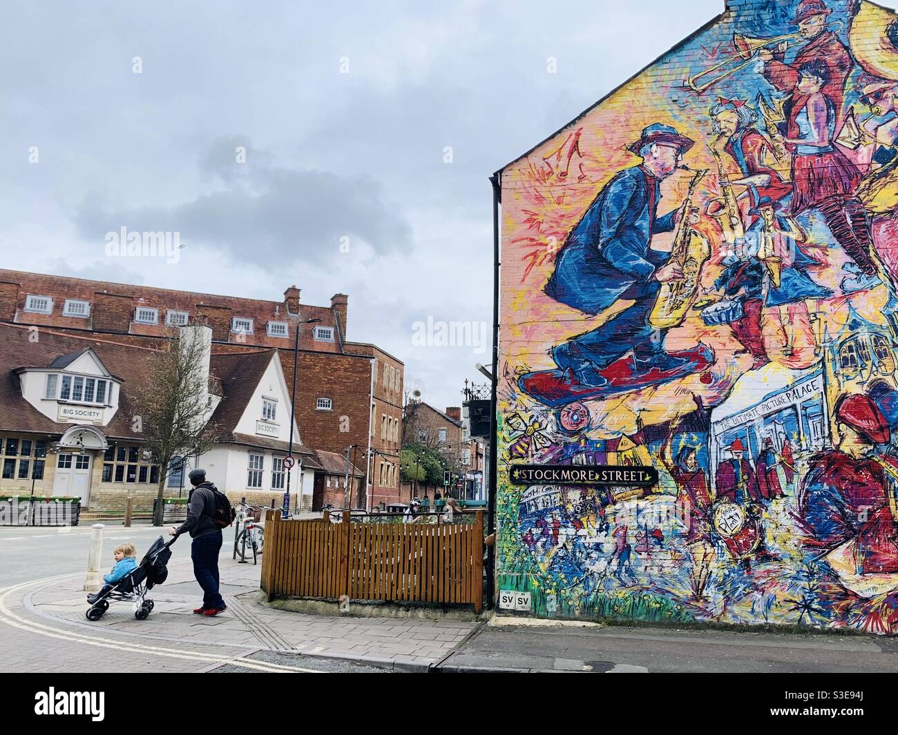 Father pushing a buggy, East Oxford Stock Photo - Alamy