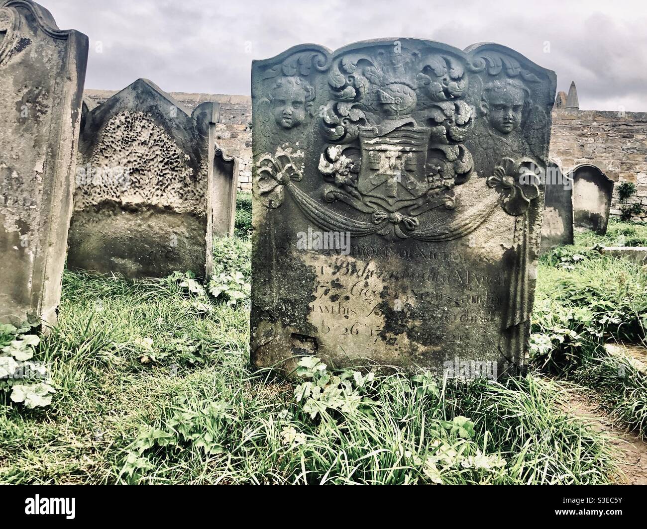 Victorian style tombstone on the graveyard of Whitby Abbey, Yorkshire ...