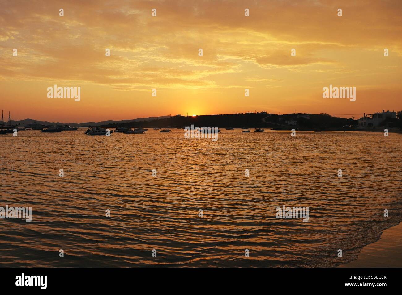 Paros , Greek Island golden sunset Stock Photo - Alamy