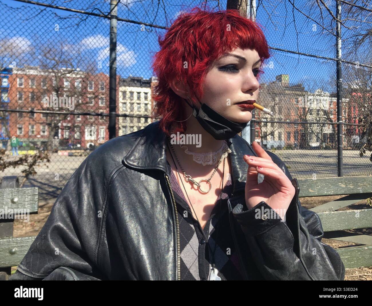 Smoking girl in leather hi-res stock photography and images - Alamy