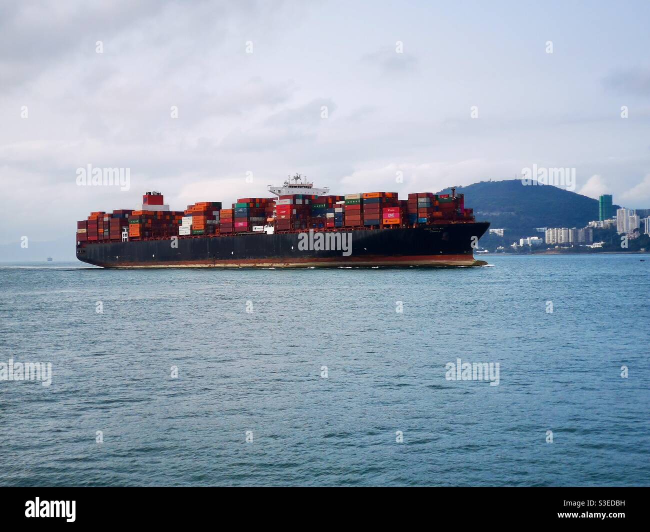 Container ship crossing east hi-res stock photography and images - Alamy