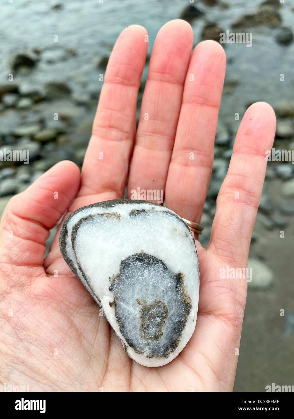 Rock in hand hi-res stock photography and images - Alamy
