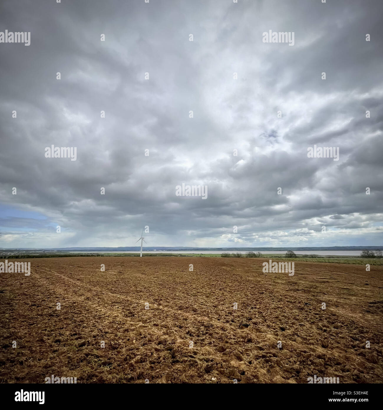 Wind Turbine under a dramatic sky Stock Photo - Alamy
