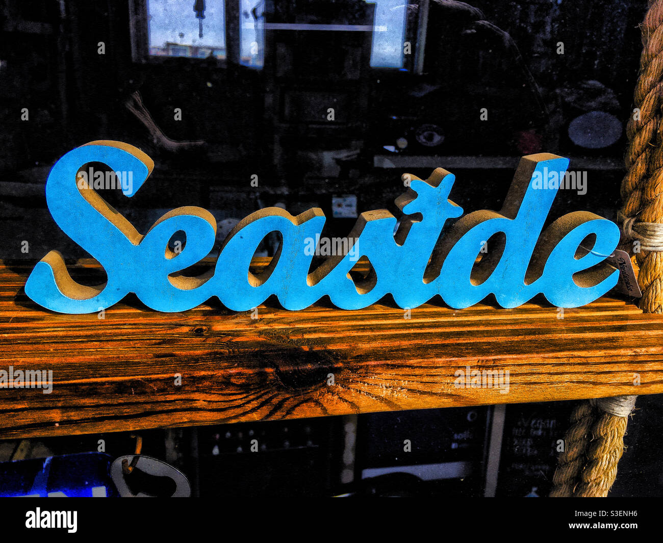 Sign saying Seaside, in a shop window Stock Photo - Alamy