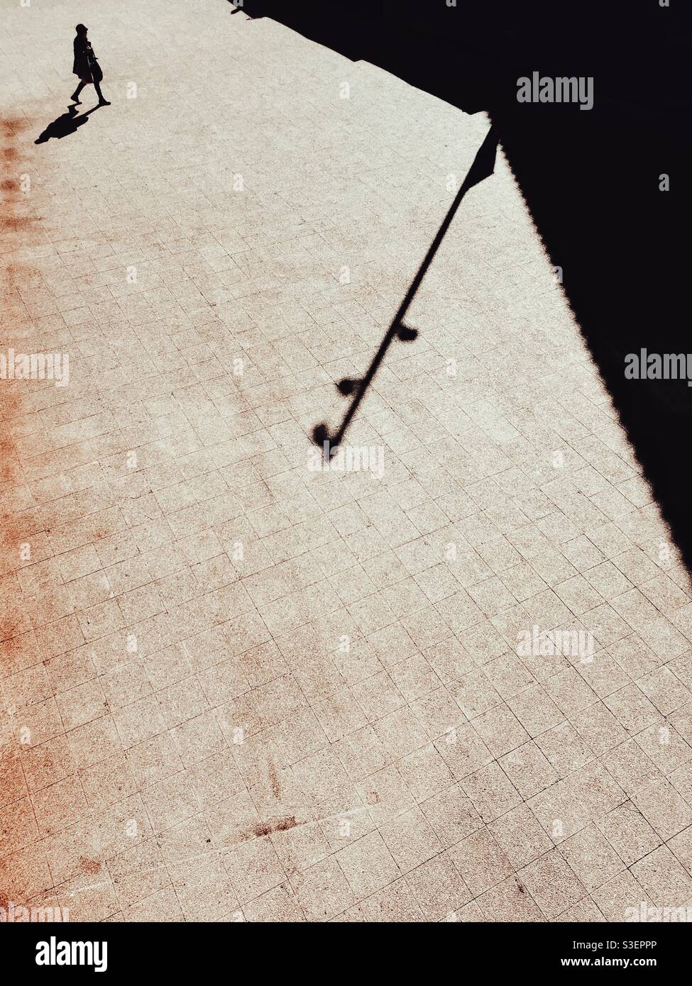 One person walking hi-res stock photography and images - Alamy