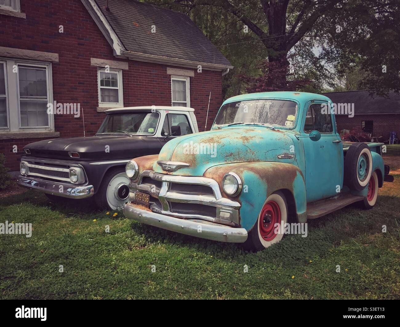 Two classic pickups in vintage look photo Stock Photo - Alamy