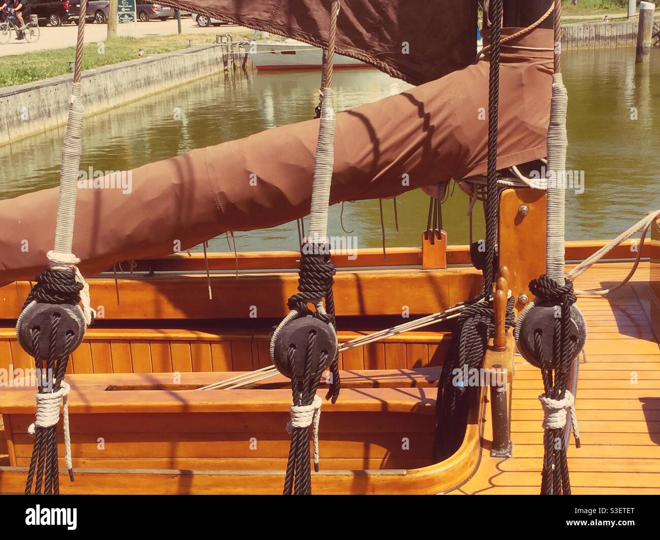 Ropes and sails on a wooden sailing ship Stock Photo - Alamy