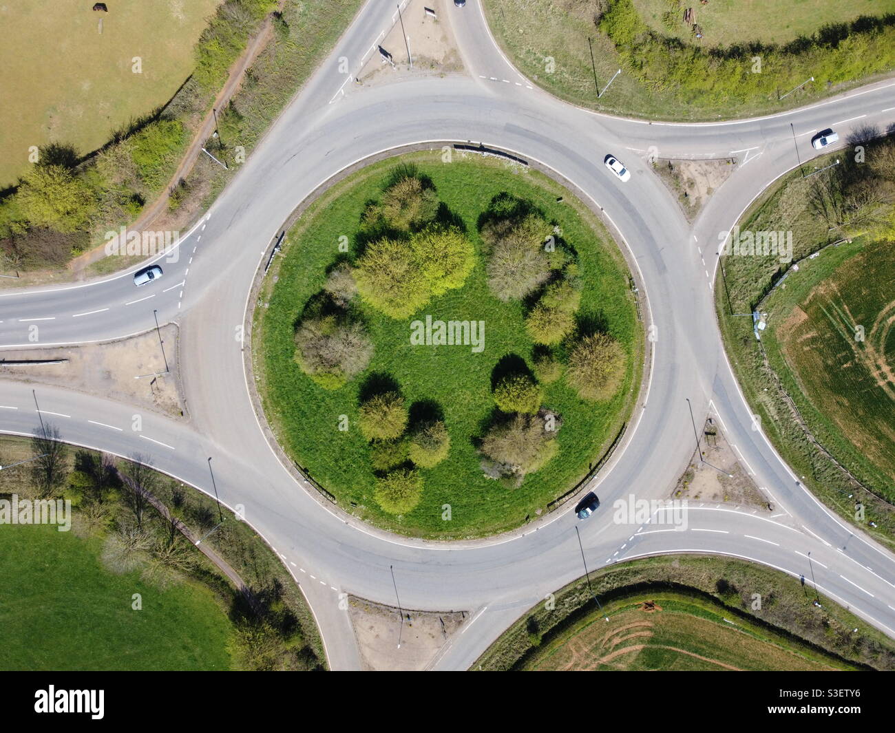 Cars roundabout hi-res stock photography and images - Alamy