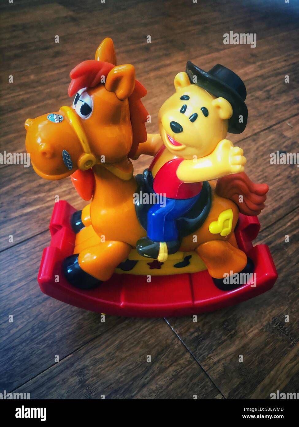 Memories of childhood - a toy battery operated bear riding a pony Stock ...