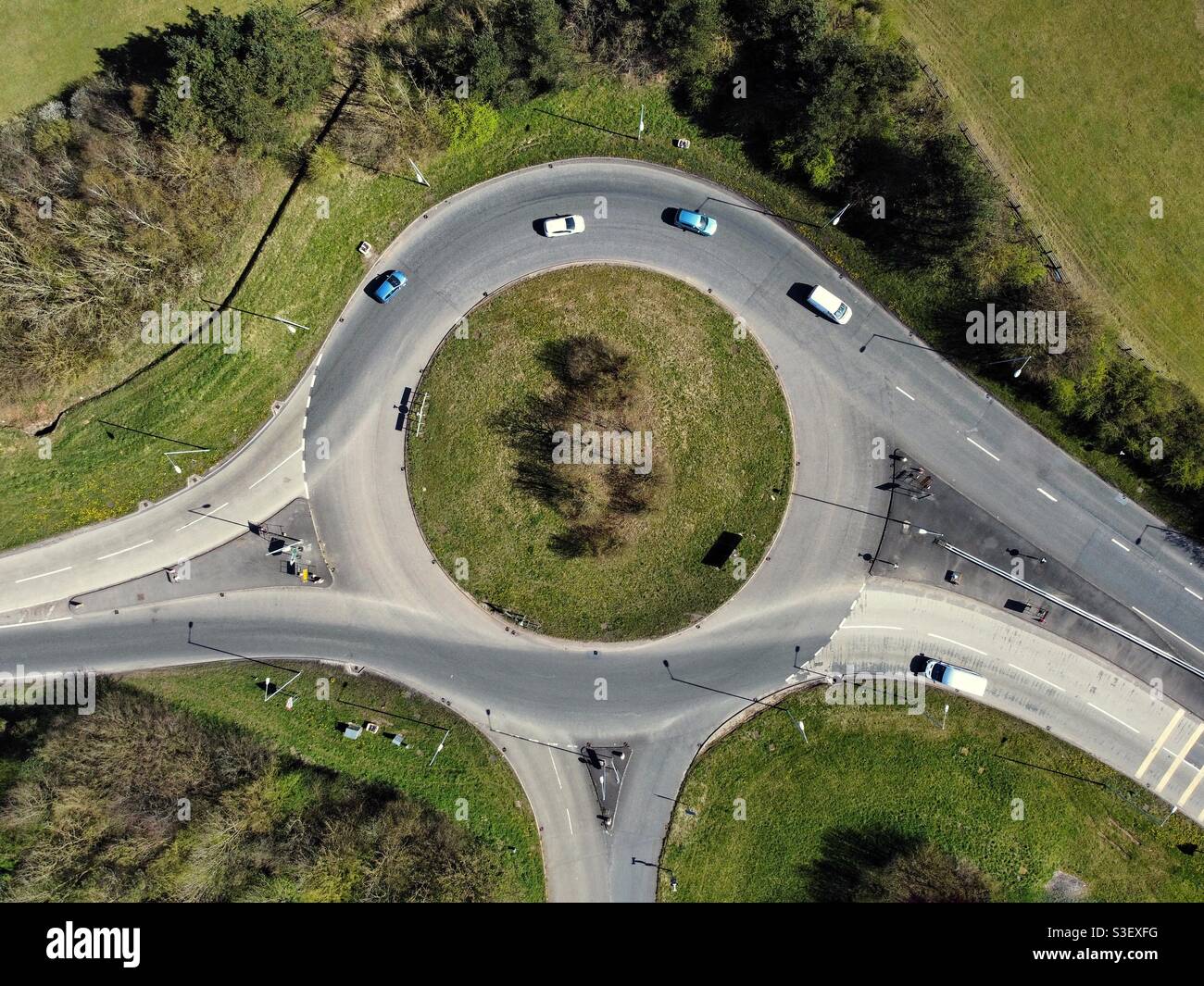 Cars on a roundabout Stock Photo - Alamy